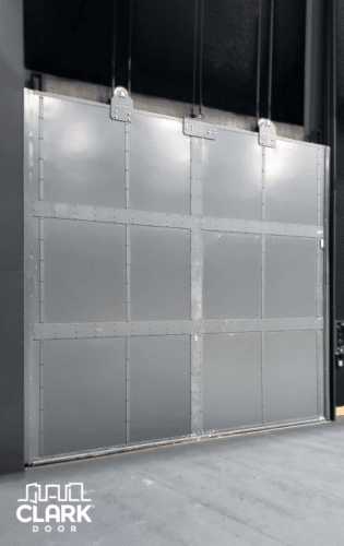 Vertical Doors | Products | Allmark Door
